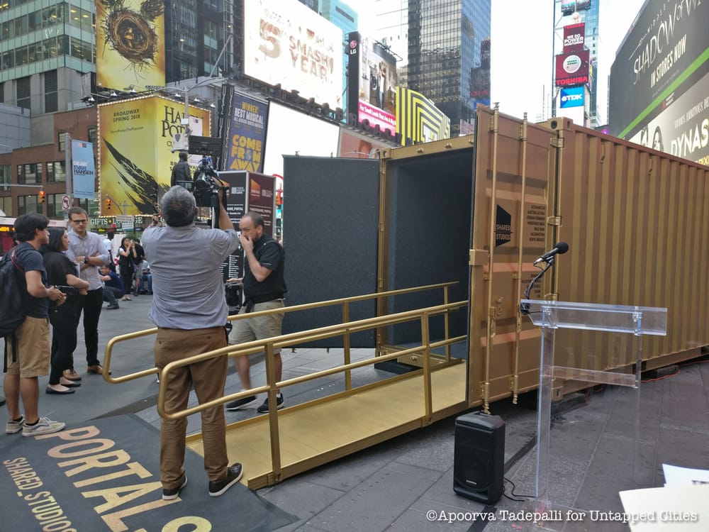 Gold Shipping Container in NYC's Times Square is a Portal that Connects ...