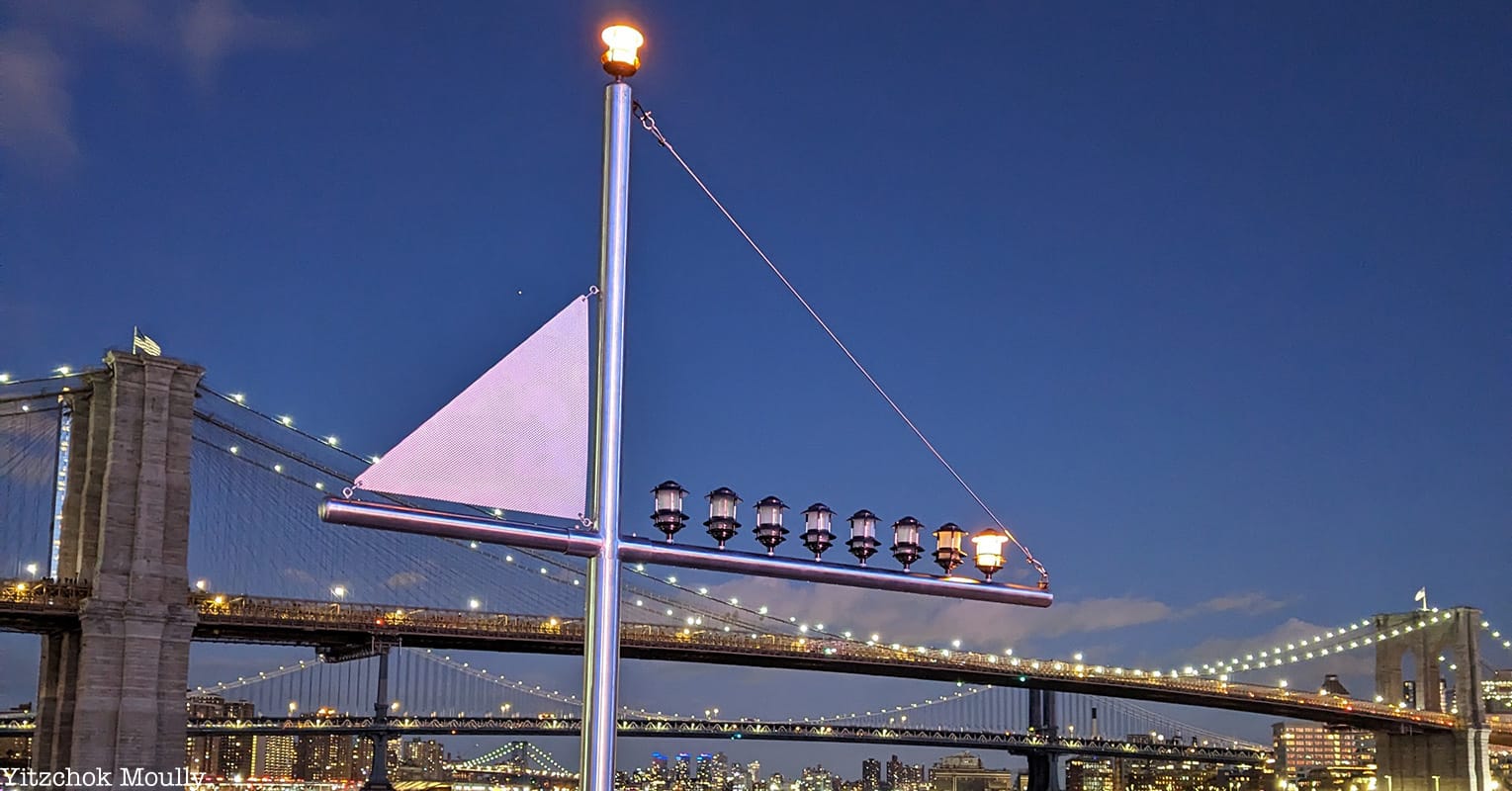 A Sailboat-Shaped Seaport Menorah Lights Up in NYC - Untapped New York